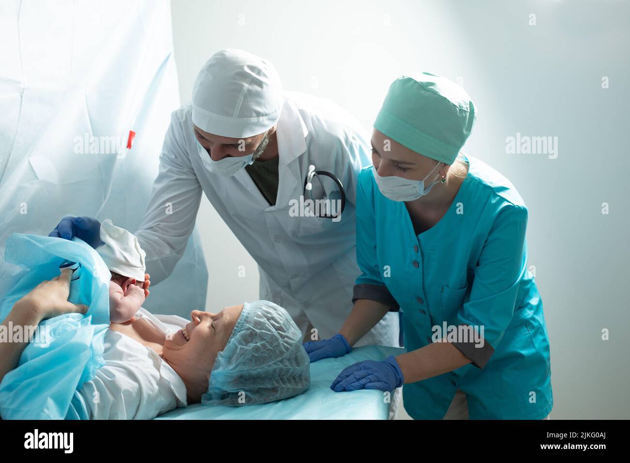 Mother look to her newborn baby in hospital Stock Photo - Alamy