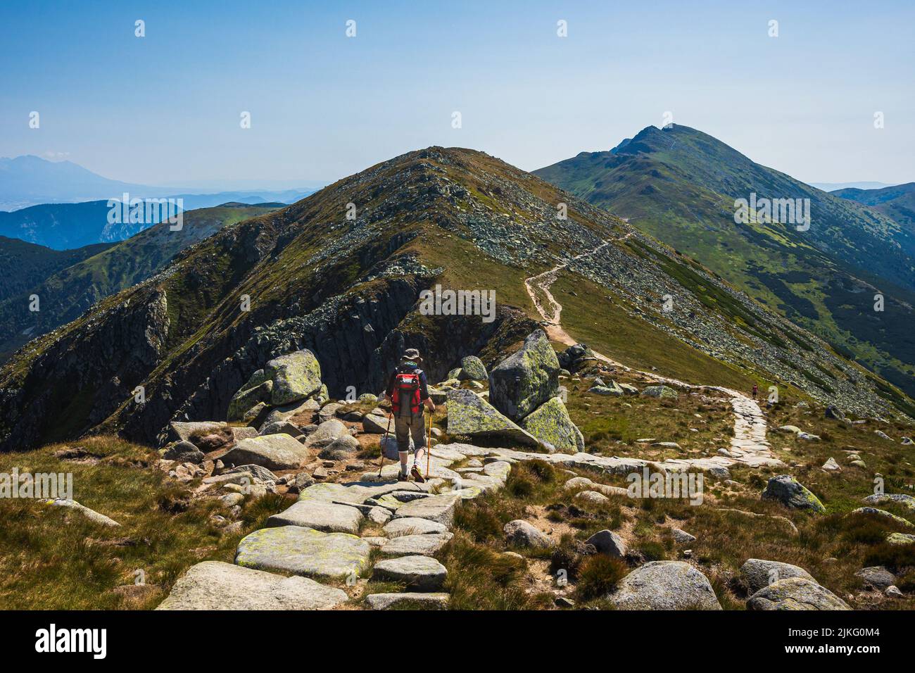 Senior man on a path around Chopok and Dumbier mountain with Stefanika ...