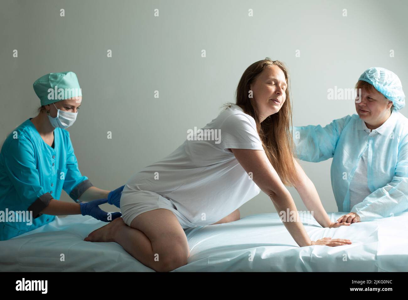 Child birth process, helping personal during labour Stock Photo - Alamy