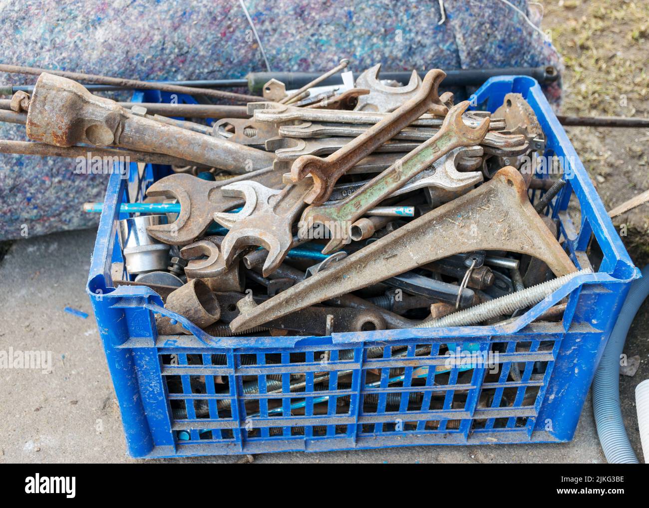 metal waste bin, container full of various iron waste, rusty old ...