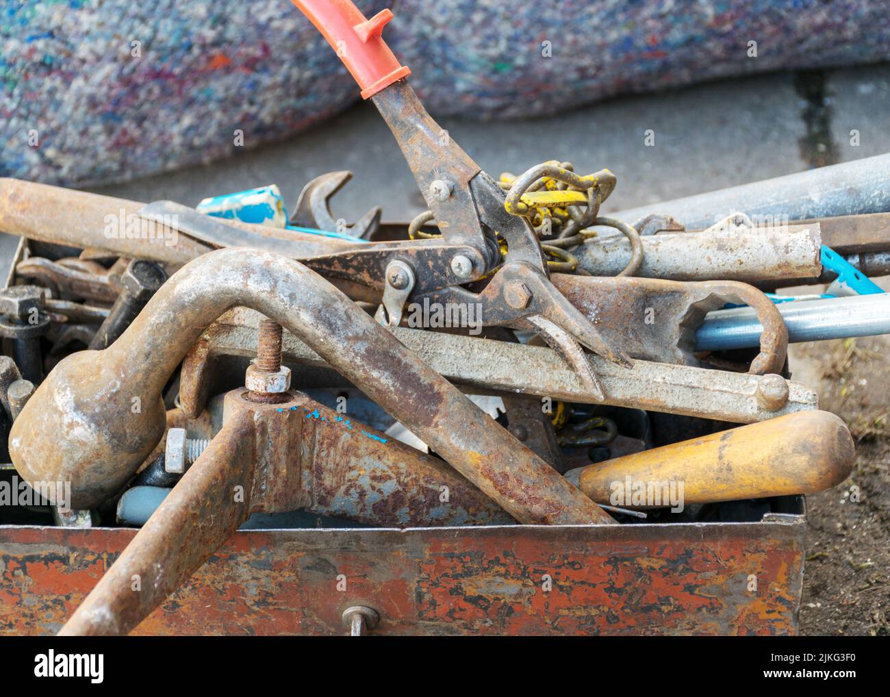 metal waste bin, container full of various iron waste, rusty old ...