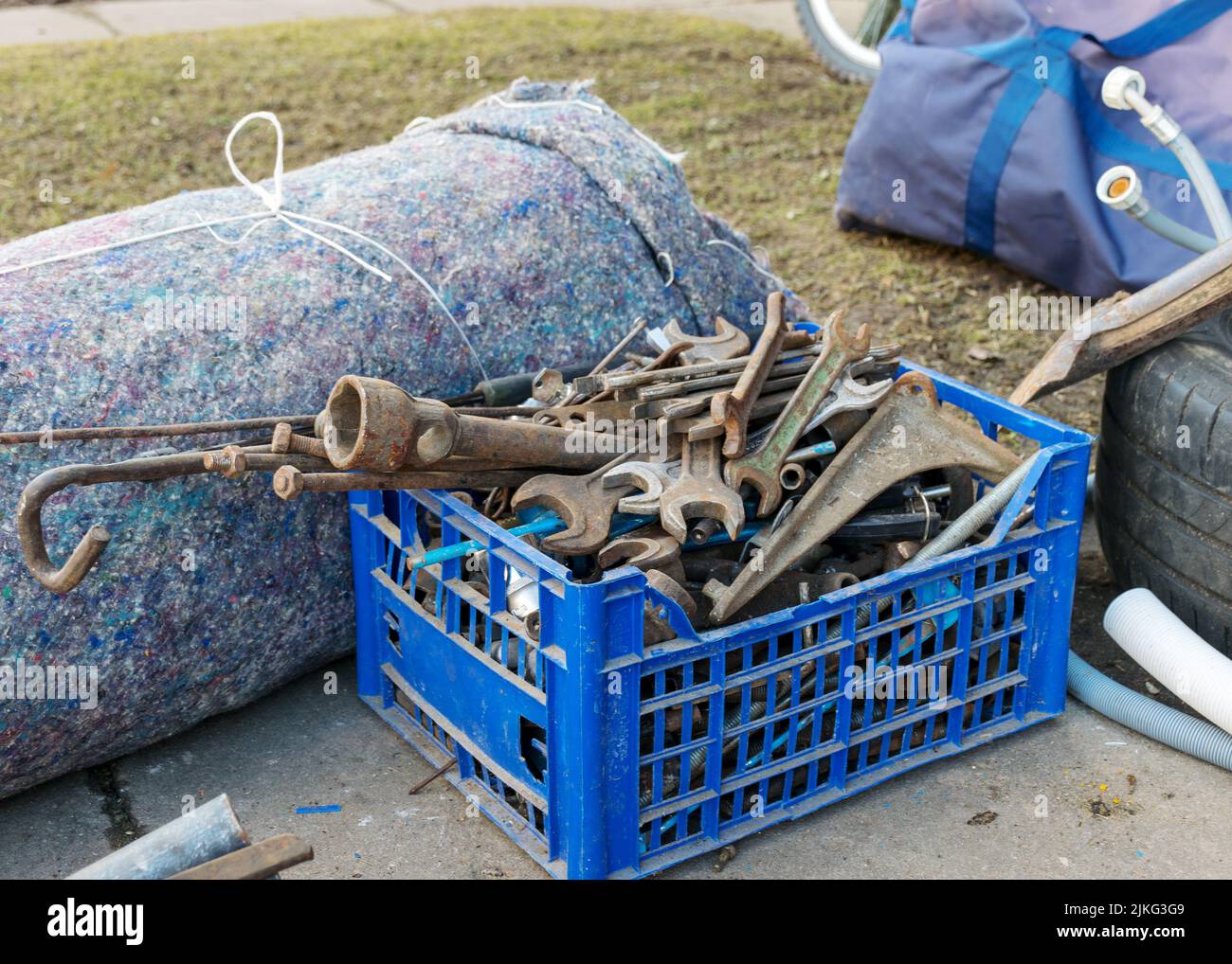 metal waste bin, container full of various iron waste, rusty old ...