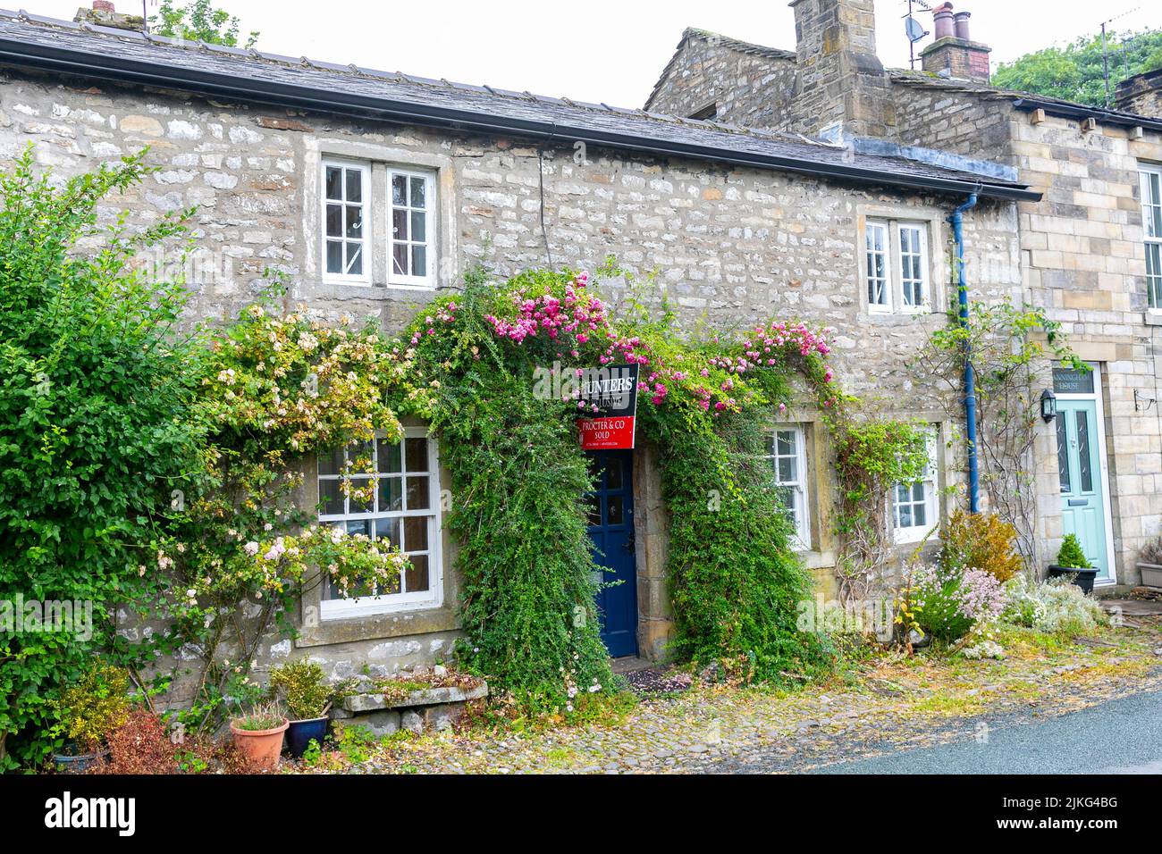 Kettlewell village in the Yorkshire Dales and stone terraced cottages ...