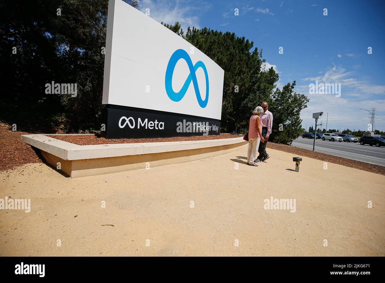 Menlo Park, United States. 01st Aug, 2022. People stand outside the ...
