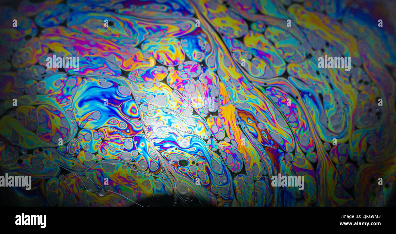 Oil rainbow water hi-res stock photography and images - Alamy