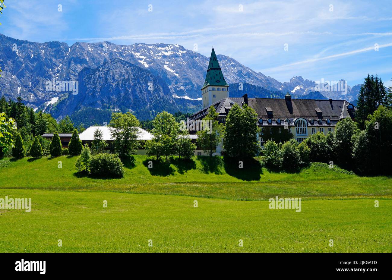 a scenic view of the Elmau Schloss Hotel in the german Alps (Germany ...