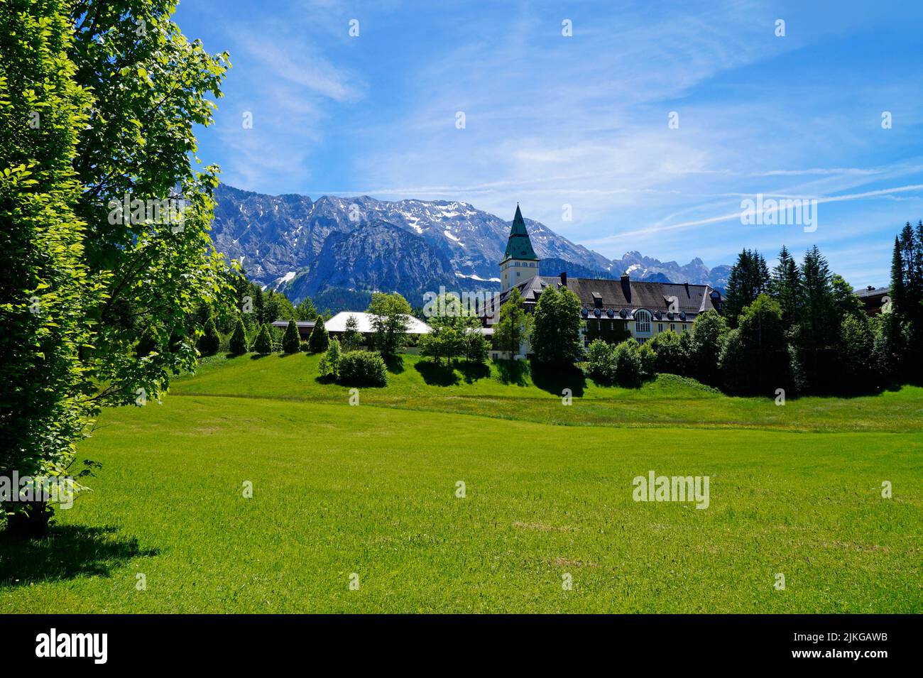 a scenic view of the Elmau Schloss Hotel in the german Alps (Germany ...