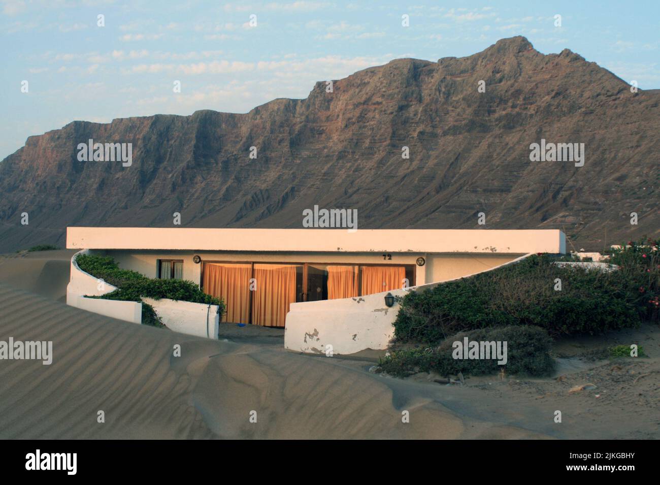 View of one of the houses in the bungalow area of Caleta de Famara at ...