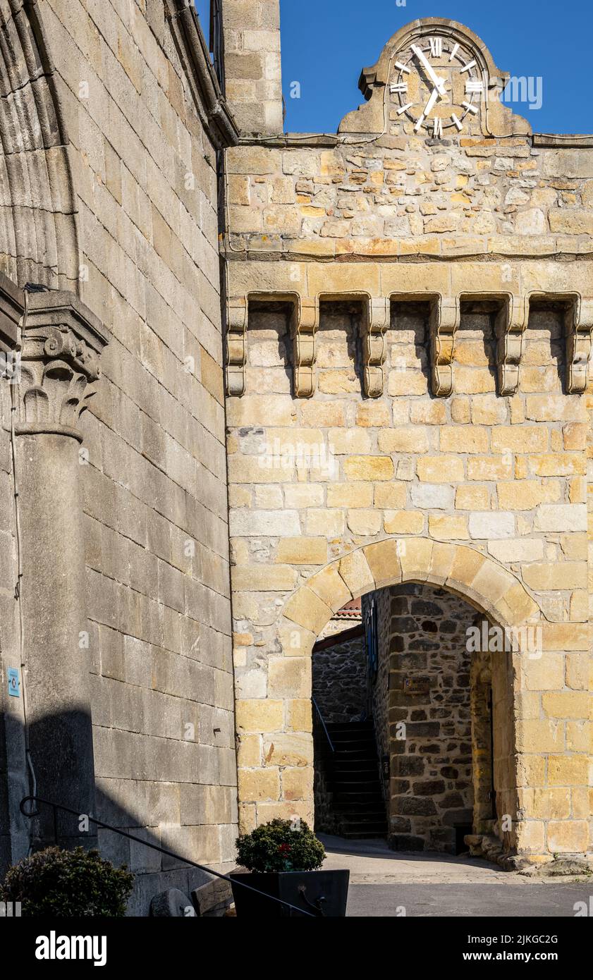 Fortified gate, medieval stone building, in the village of Montpeyroux ...
