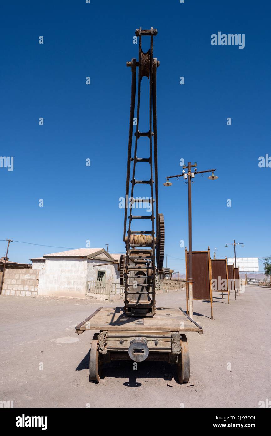 Outdoor museum display of an old lifting crane on rail tracks used in ...