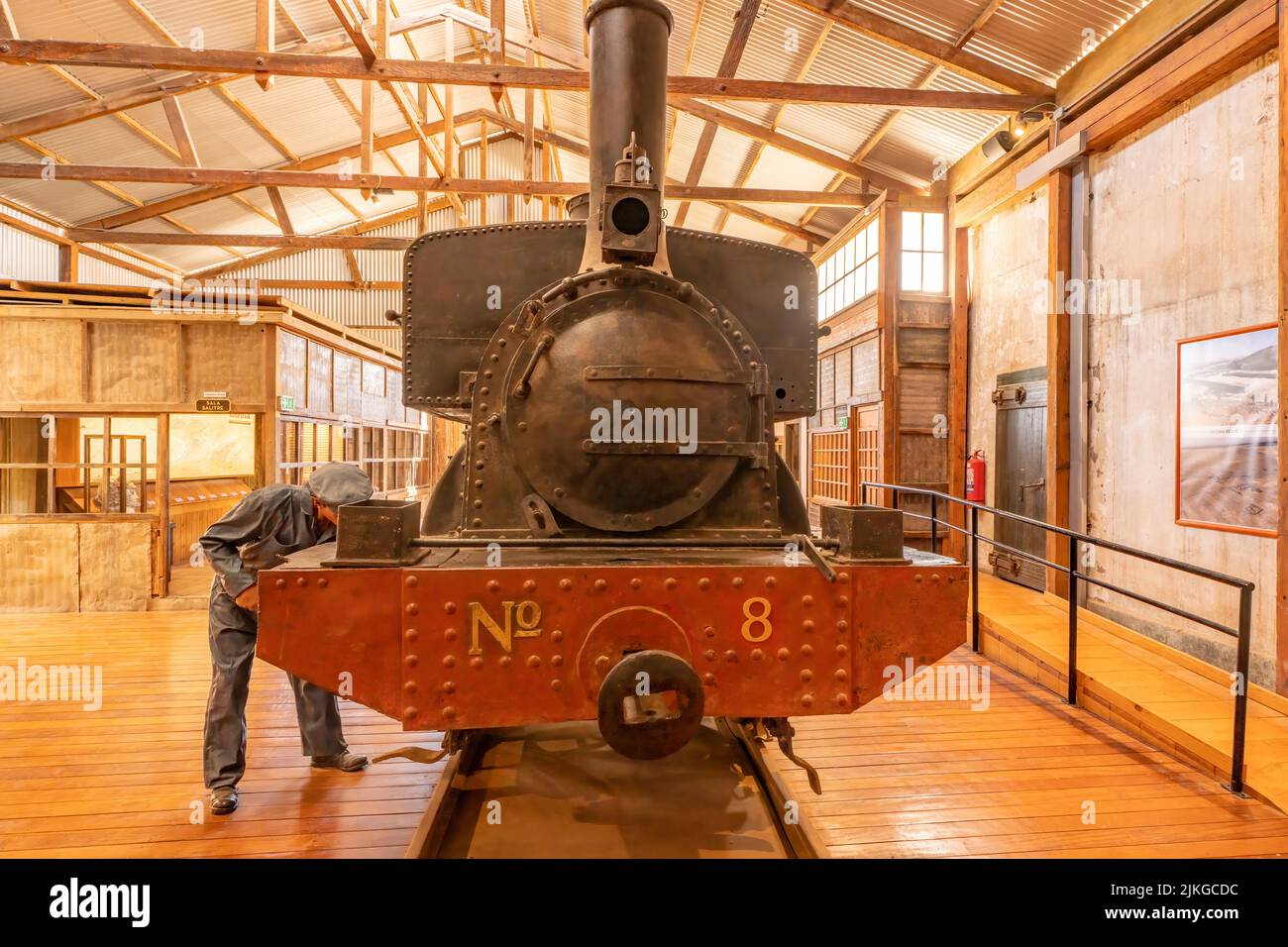 A steam engine with mannequins on display in the museum of the ...