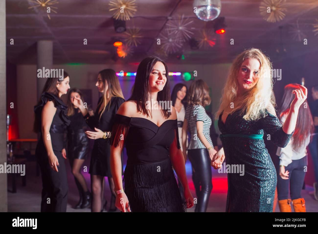 Group of dancing young people enjoying night in club Stock Photo - Alamy
