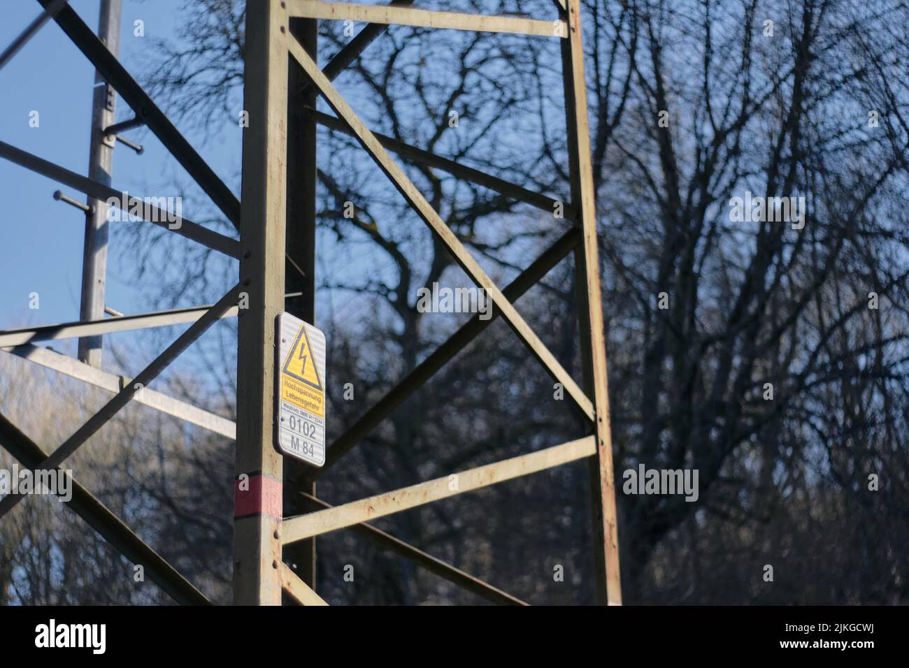 A closeup shot of the sign "caution - high voltage Stock Photo - Alamy