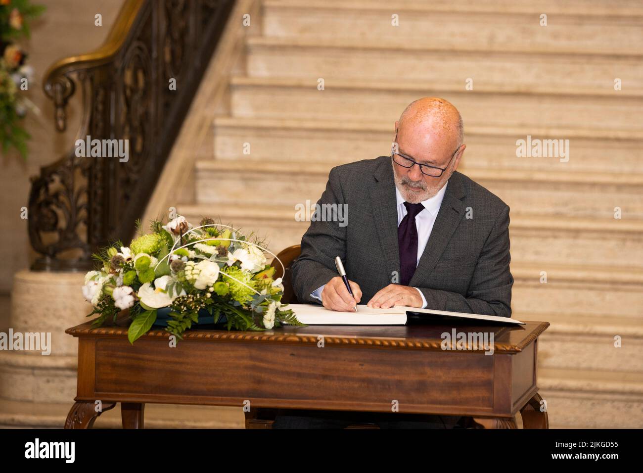 Northern Ireland Assembly Speaker Alex Maskey signing a book of ...