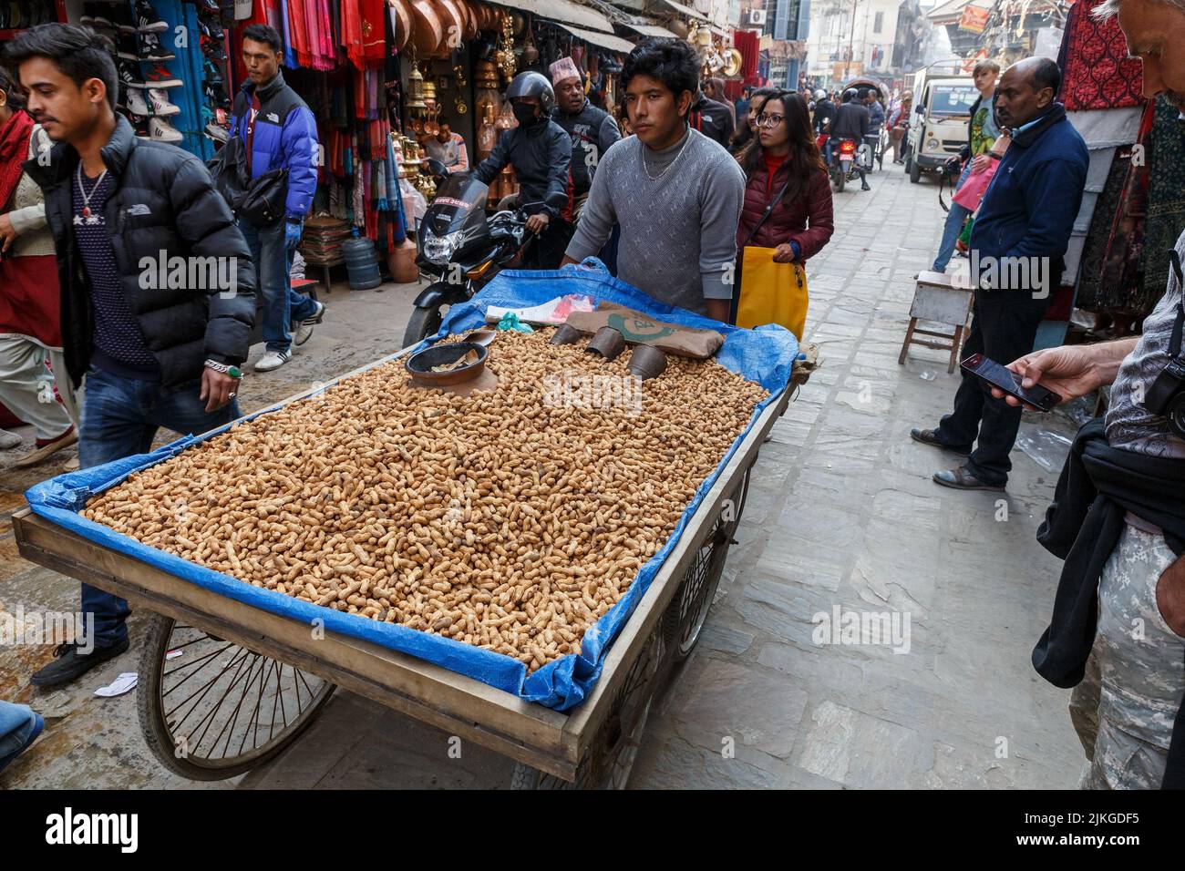 Kathmandu, Nepal - November 25, 2016: A local merchant with a cart of ...