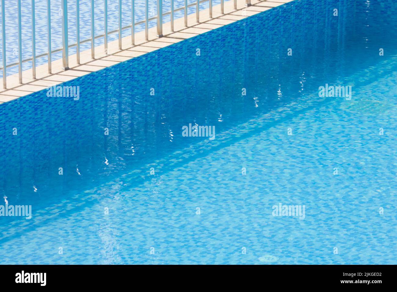 The bottom of the pool, decorated with blue ceramic mosaic Stock Photo ...