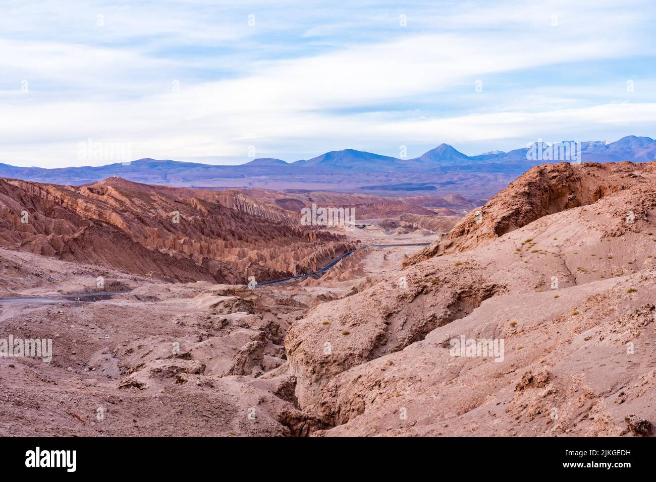 Eroded rock formations near San Pedro de Atacama with the Licancabur ...