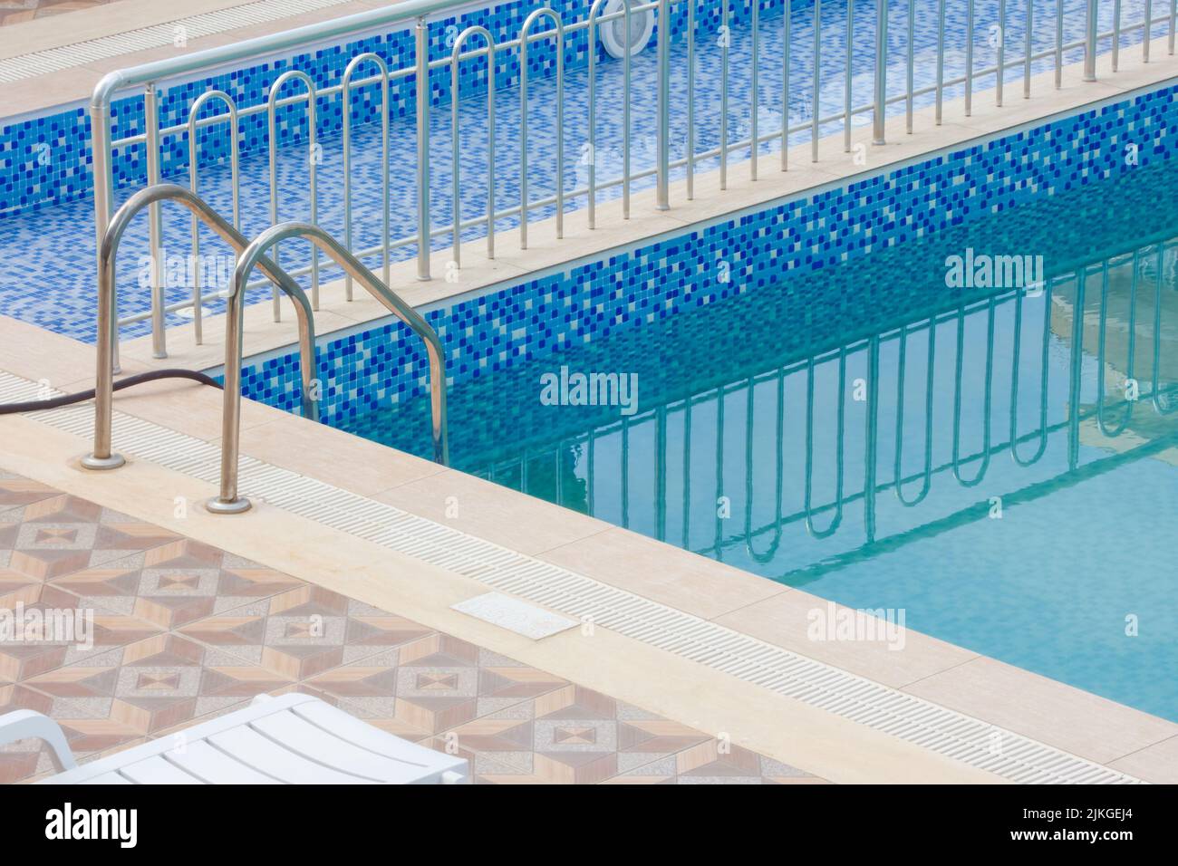 Pool filling with water before purification, handrails for entering ...
