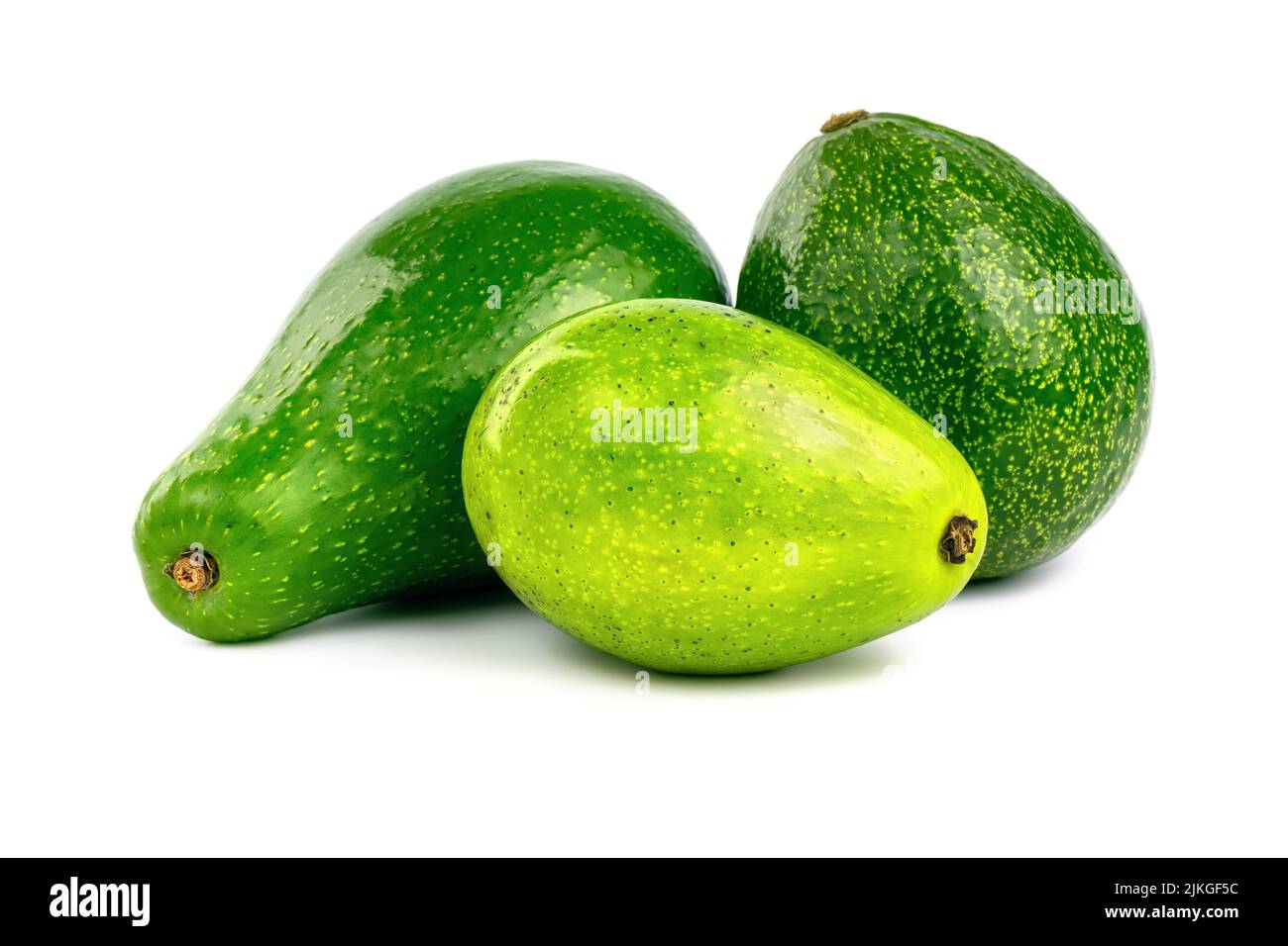 Different fresh avocados isolated on white background Stock Photo - Alamy