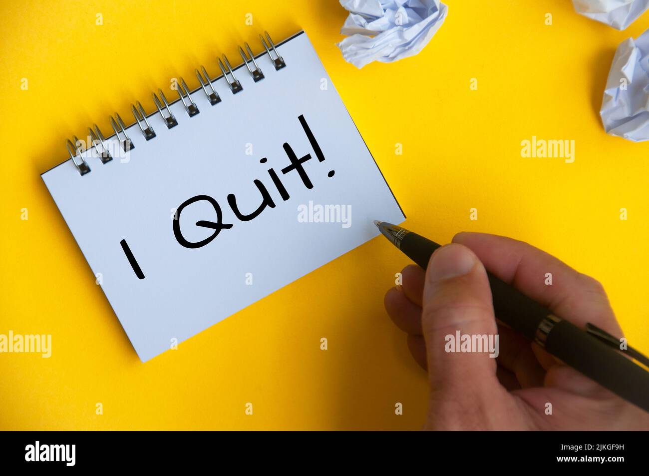 I quit text on white notepad on yellow cover background. Employment and ...