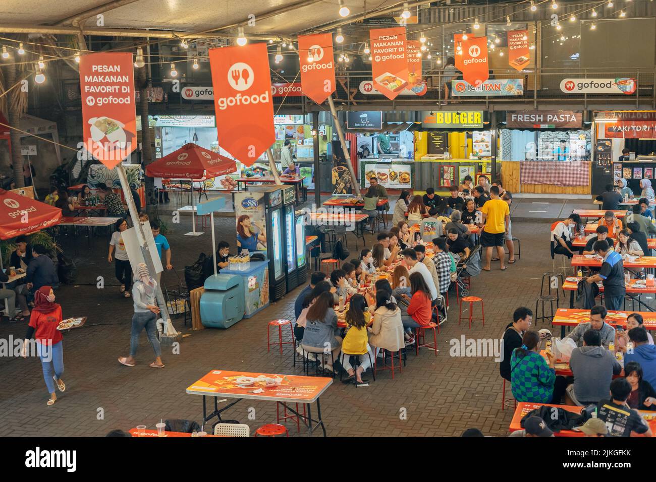 Residents enjoy dinner at Sudirman Street food center in Bandung ...