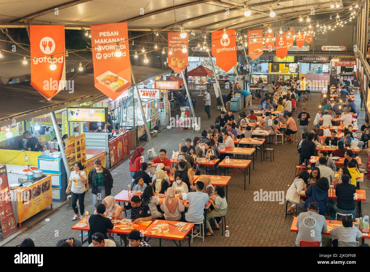 Residents enjoy dinner at Sudirman Street food center in Bandung ...