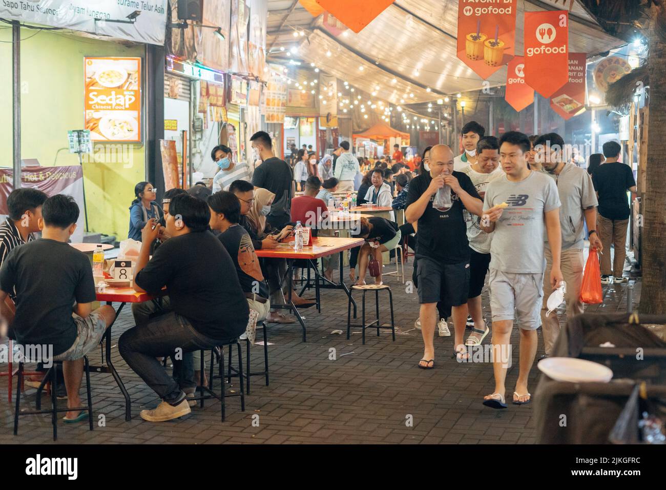 Residents enjoy dinner at Sudirman Street food center in Bandung ...