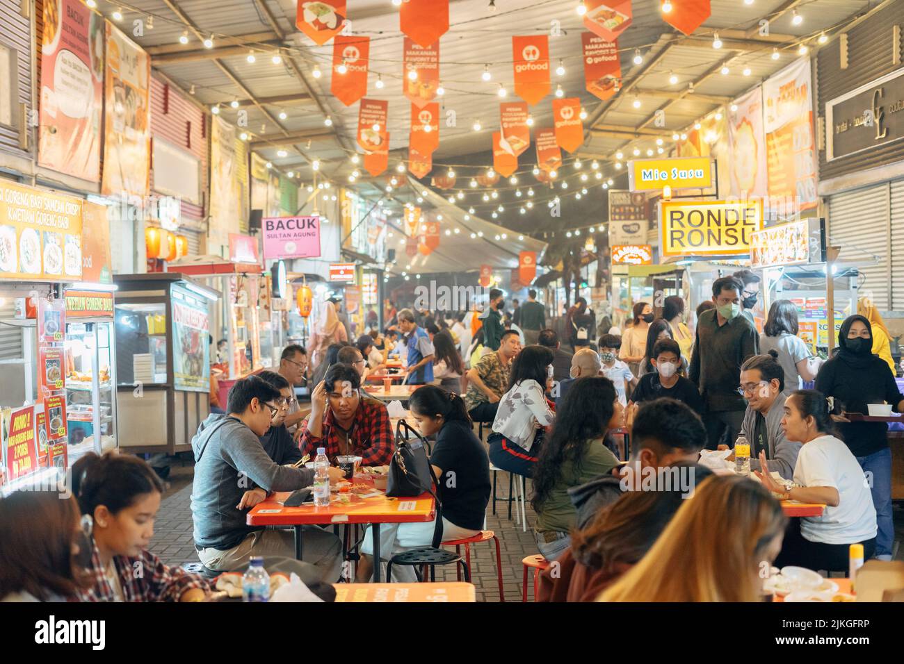 Residents enjoy dinner at Sudirman Street food center in Bandung ...