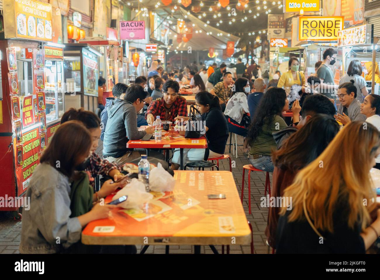 Residents enjoy dinner at Sudirman Street food center in Bandung ...