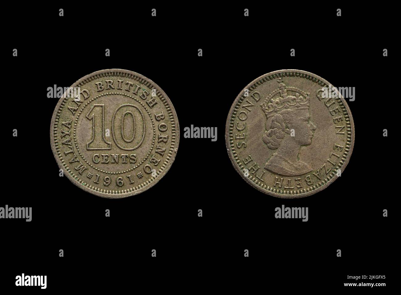 A top view closeup of British coins obverse and reverse on a black ...