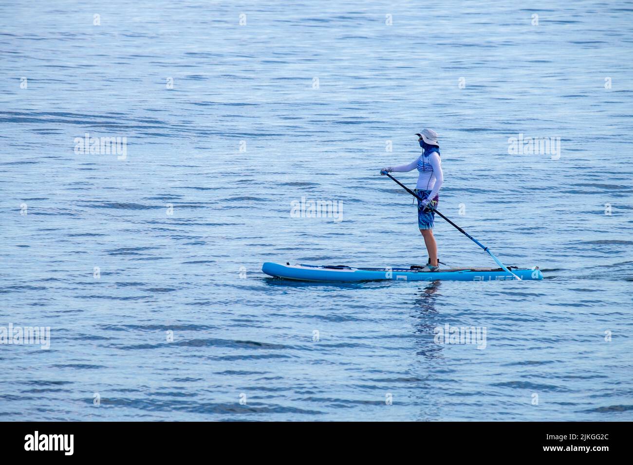 Woman silhouette paddle surf hi-res stock photography and images - Alamy