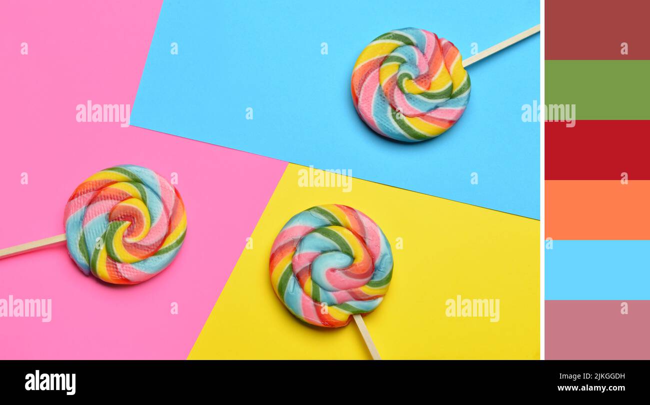 Tasty lollipops on colorful background. Different color patterns Stock ...