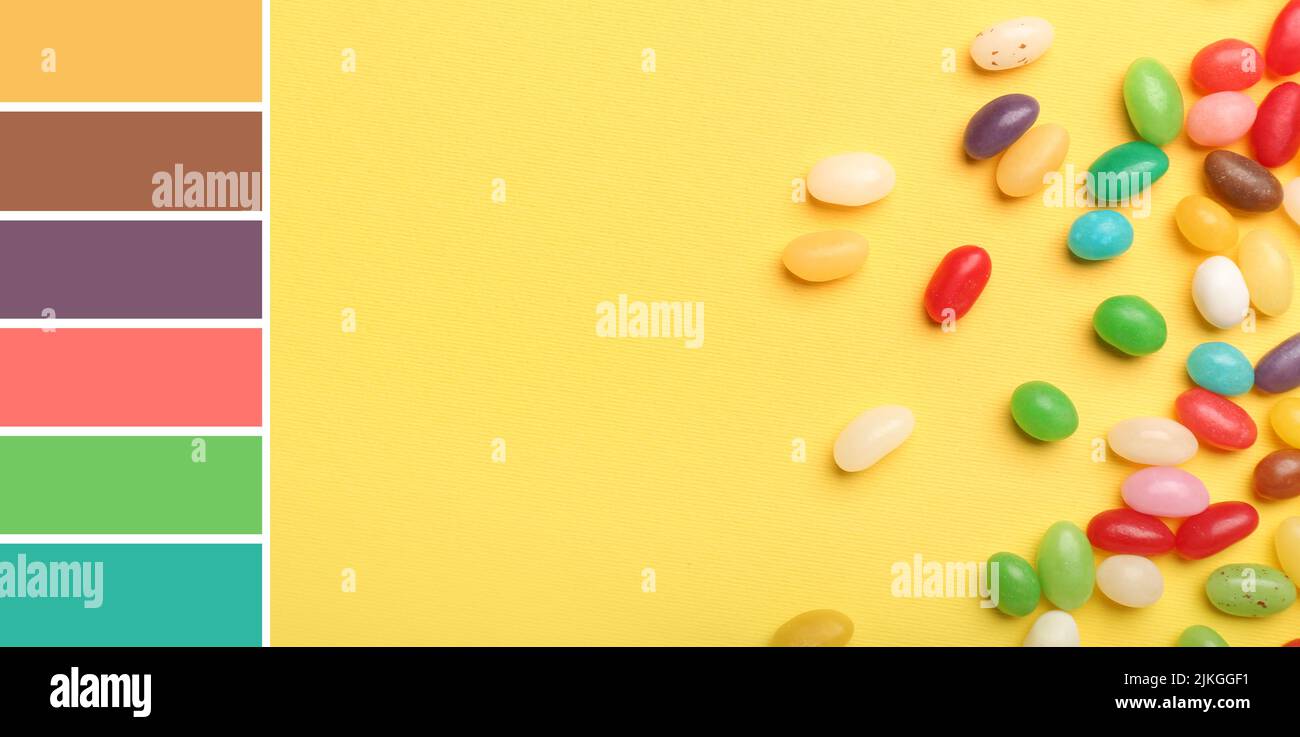 Sweet candies on yellow background. Different color patterns Stock ...