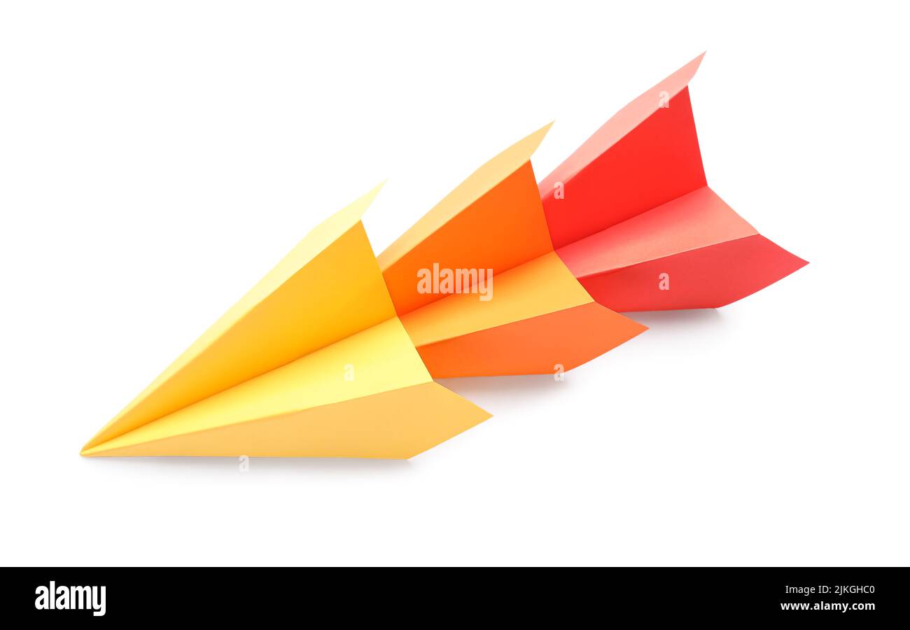 Colorful paper planes on white background Stock Photo - Alamy