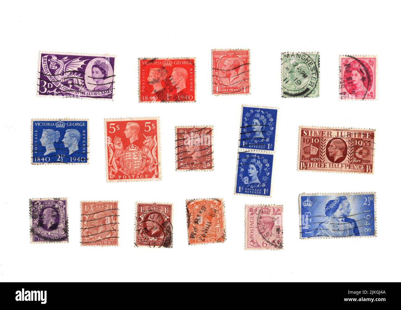 A selection of old postage stamps from Great Britain on a white ...