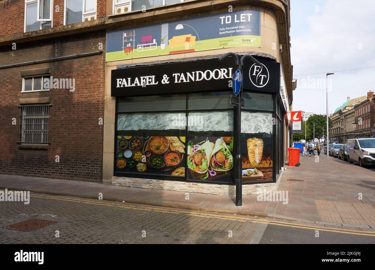 Fast food store on a street corner Stock Photo - Alamy