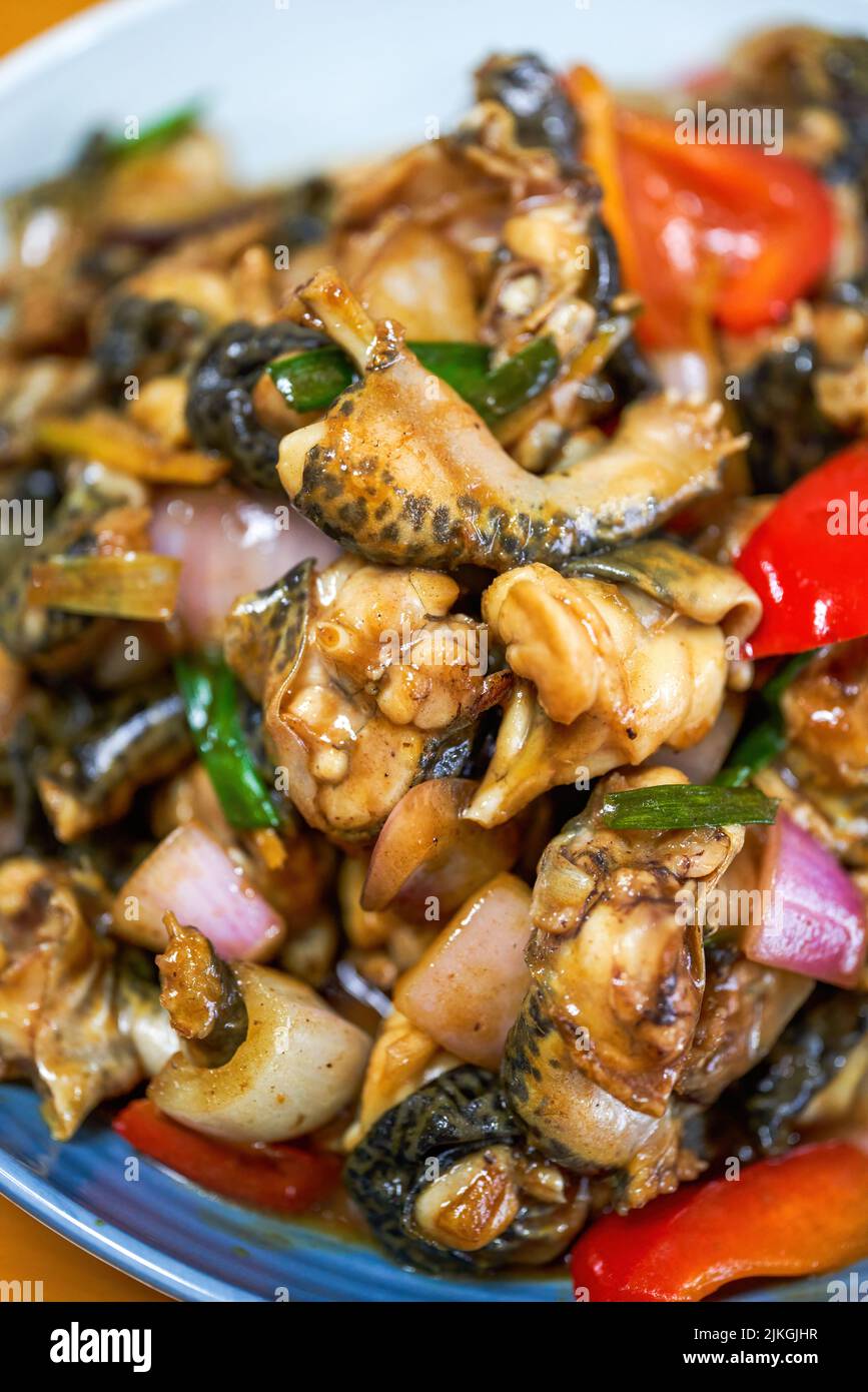 A delicious Chinese dish, fried bullfrog in sauce Stock Photo - Alamy