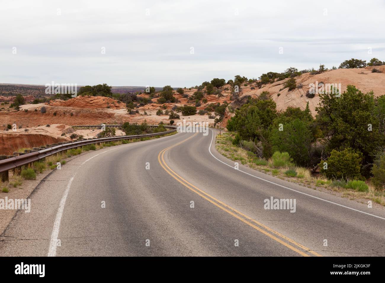 Scenic Road surrounded by Red Rock Mountains in the Desert Stock Photo ...