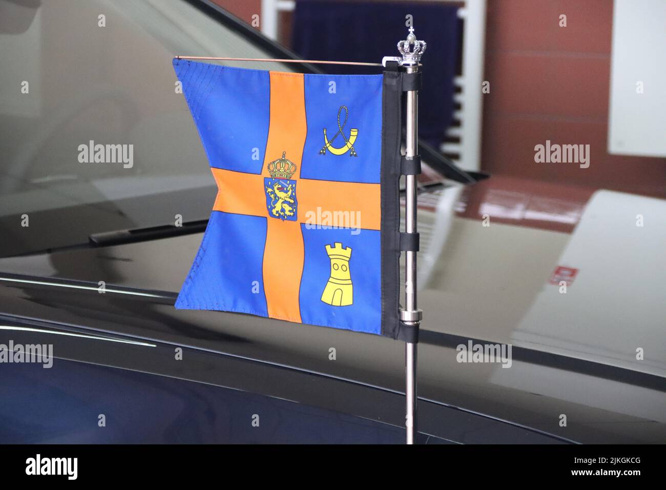 Diplomatic flag at the royal stables at Noordeinde Palace Stock Photo ...