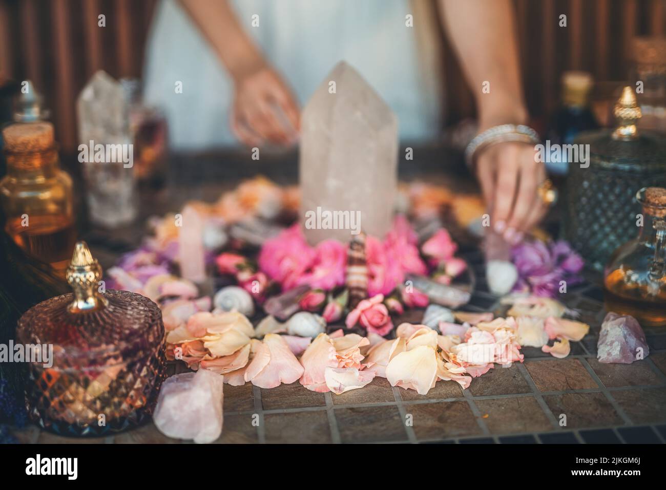 beautiful altar with crystals and rose flowers Stock Photo - Alamy