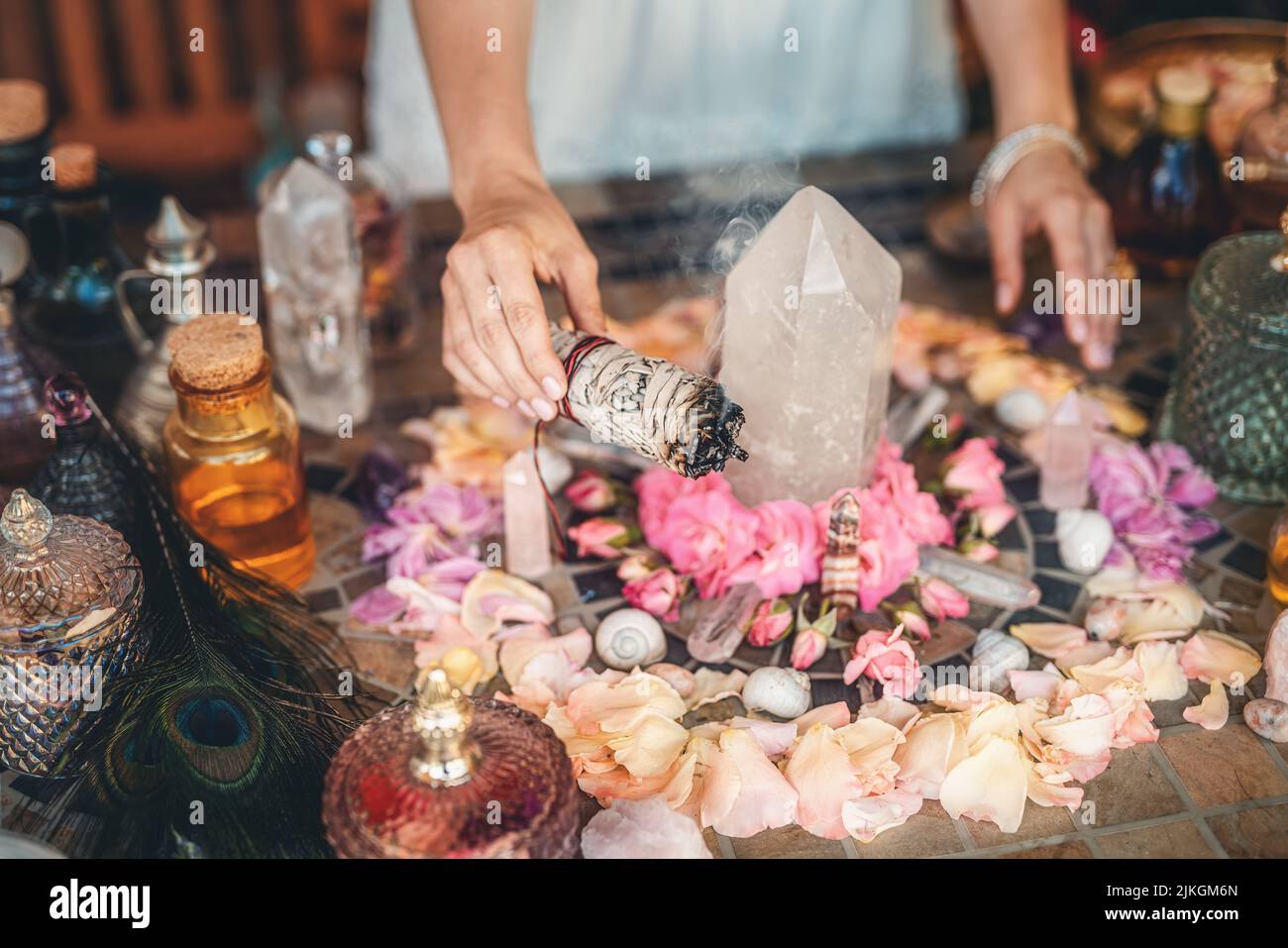 beautiful altar with crystals and rose flowers Stock Photo - Alamy