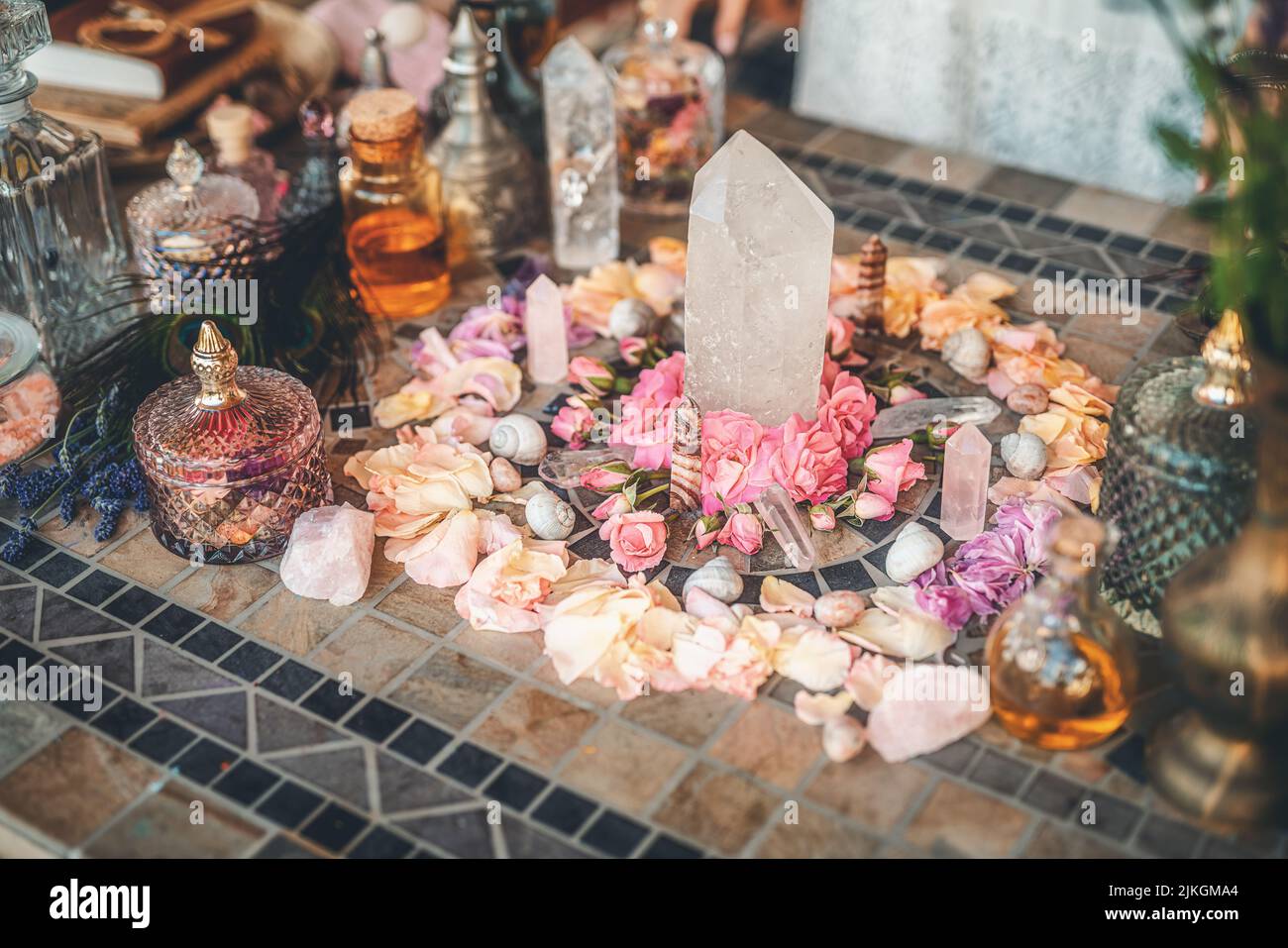 beautiful altar with crystals and rose flowers Stock Photo - Alamy