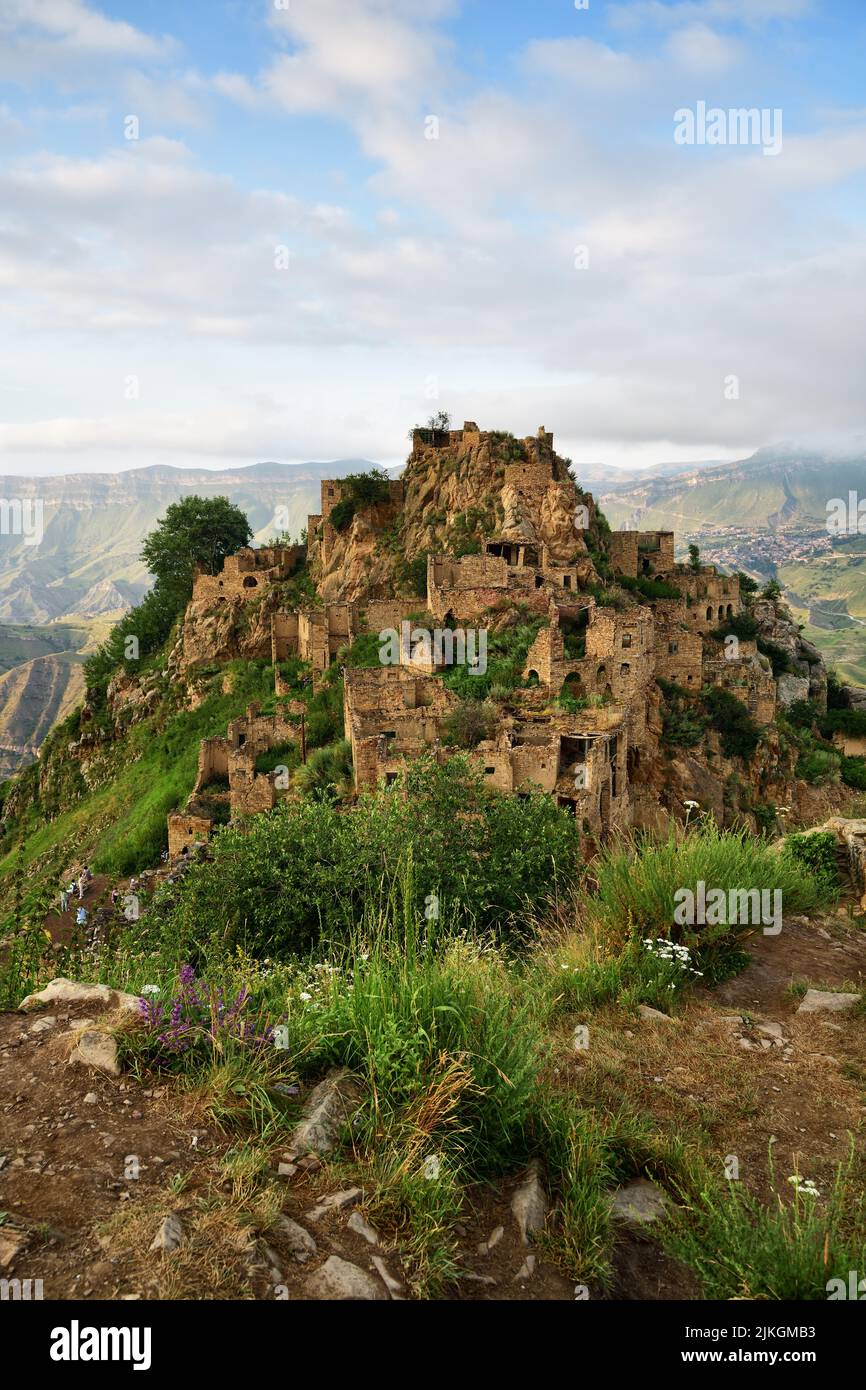 Ancient village Gamsutl on rock on background of mountains. Amazing ...