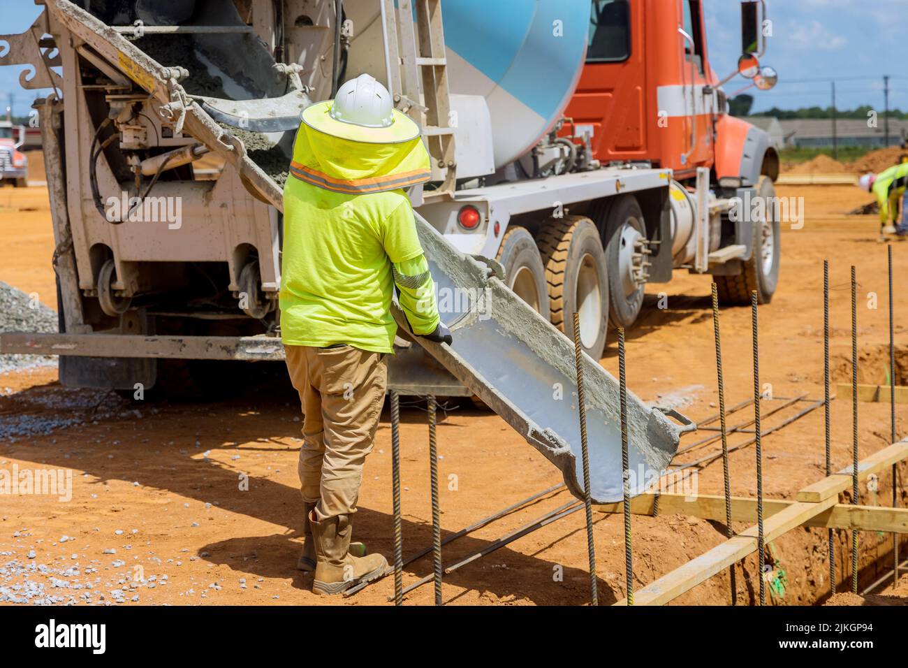 The process of pouring concrete trenches the foundation for house Stock ...