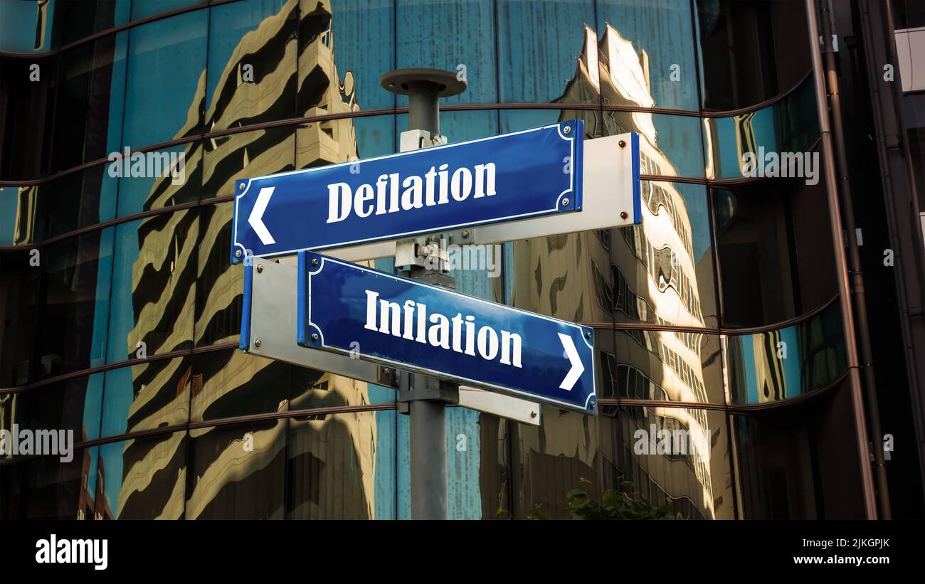 Street Sign the Direction Way to Inflation versus Deflation Stock Photo ...