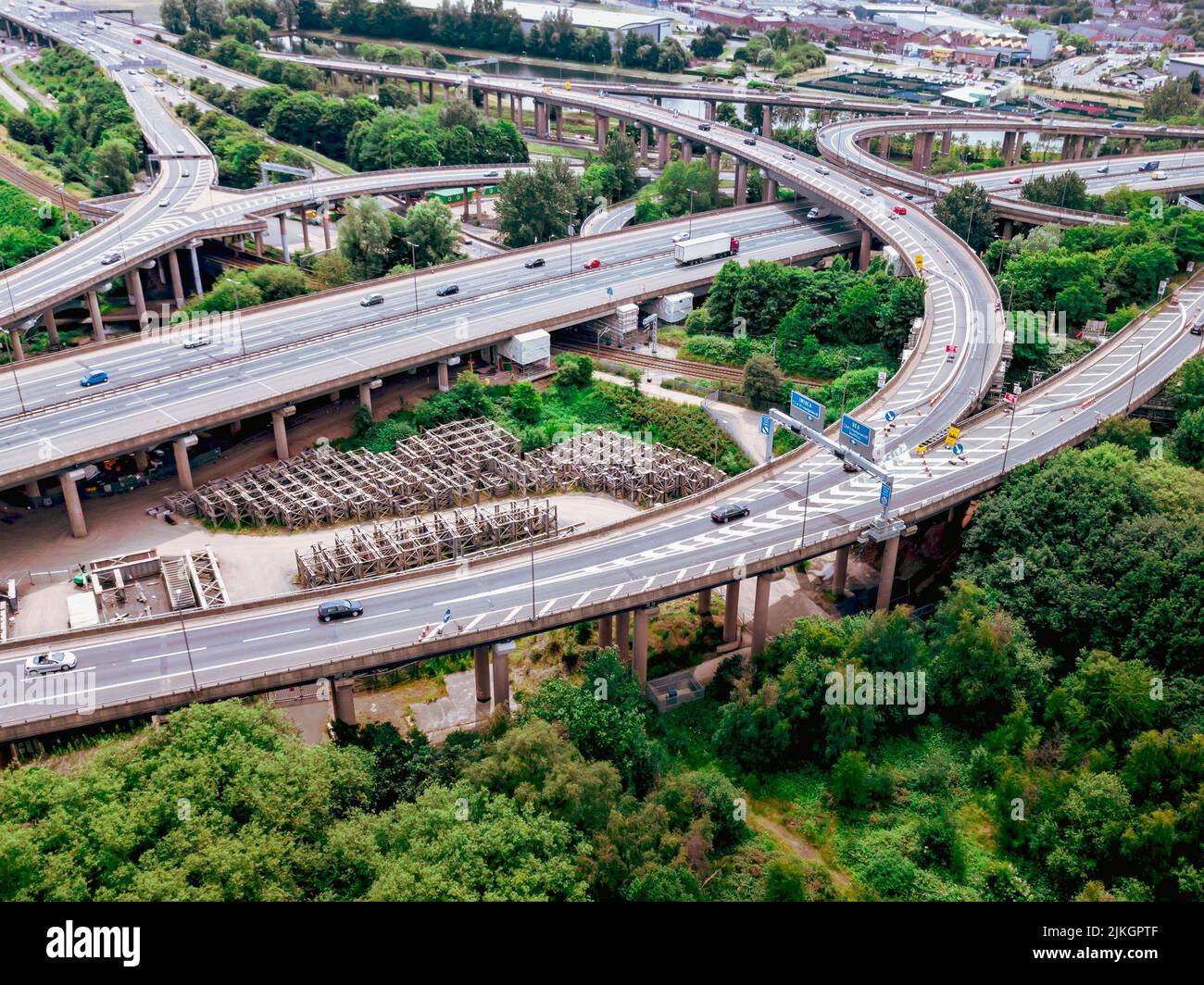 An aerial view of a complex motorway road junction with traffic Stock ...