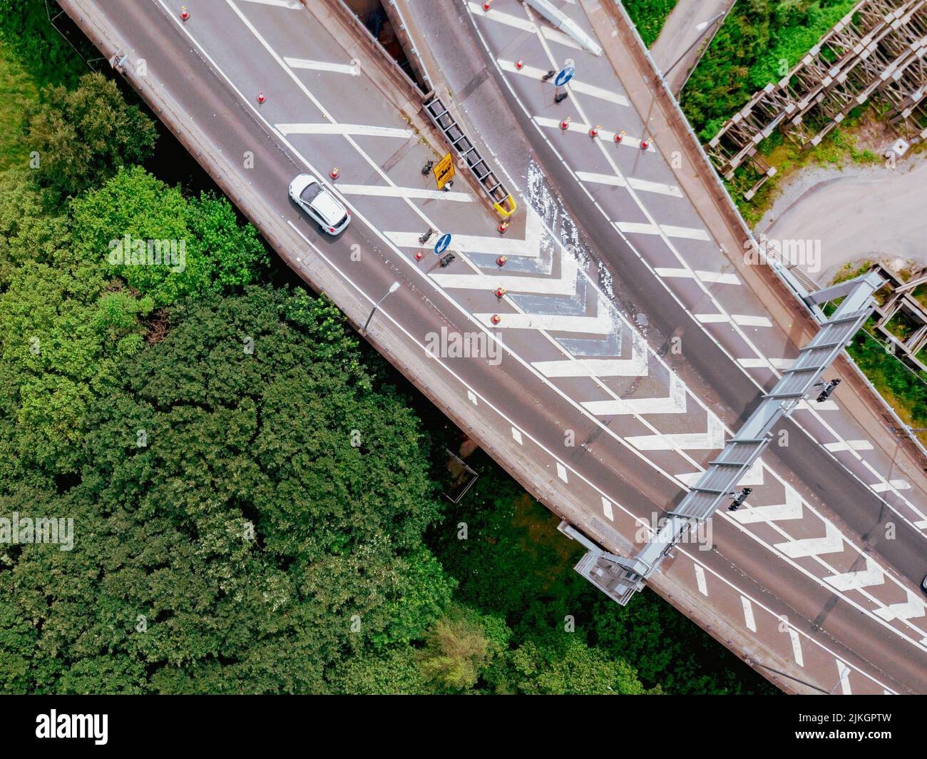 An aerial view of a complex motorway road junction with traffic Stock ...