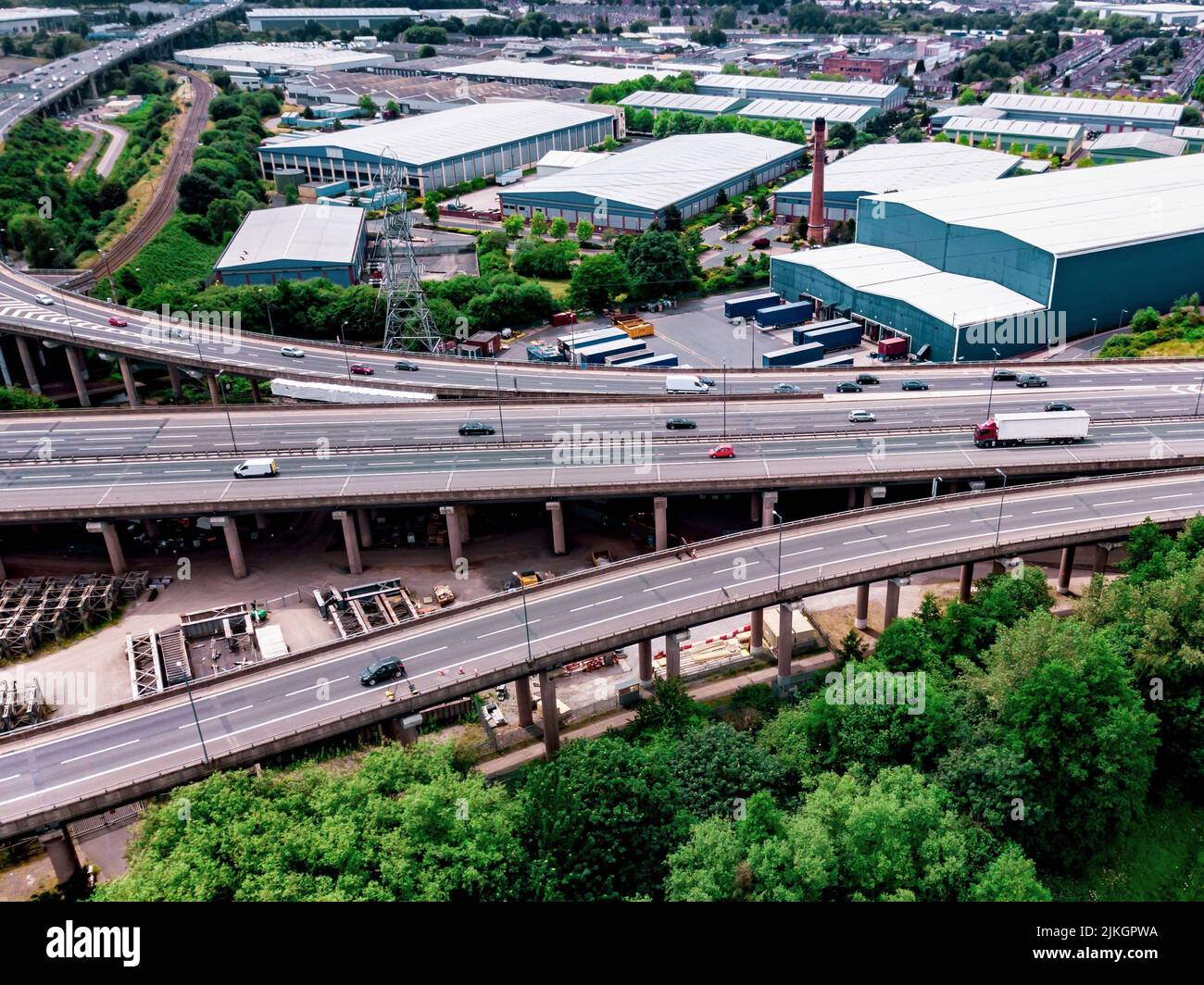 An aerial view of a complex motorway road junction with traffic Stock ...