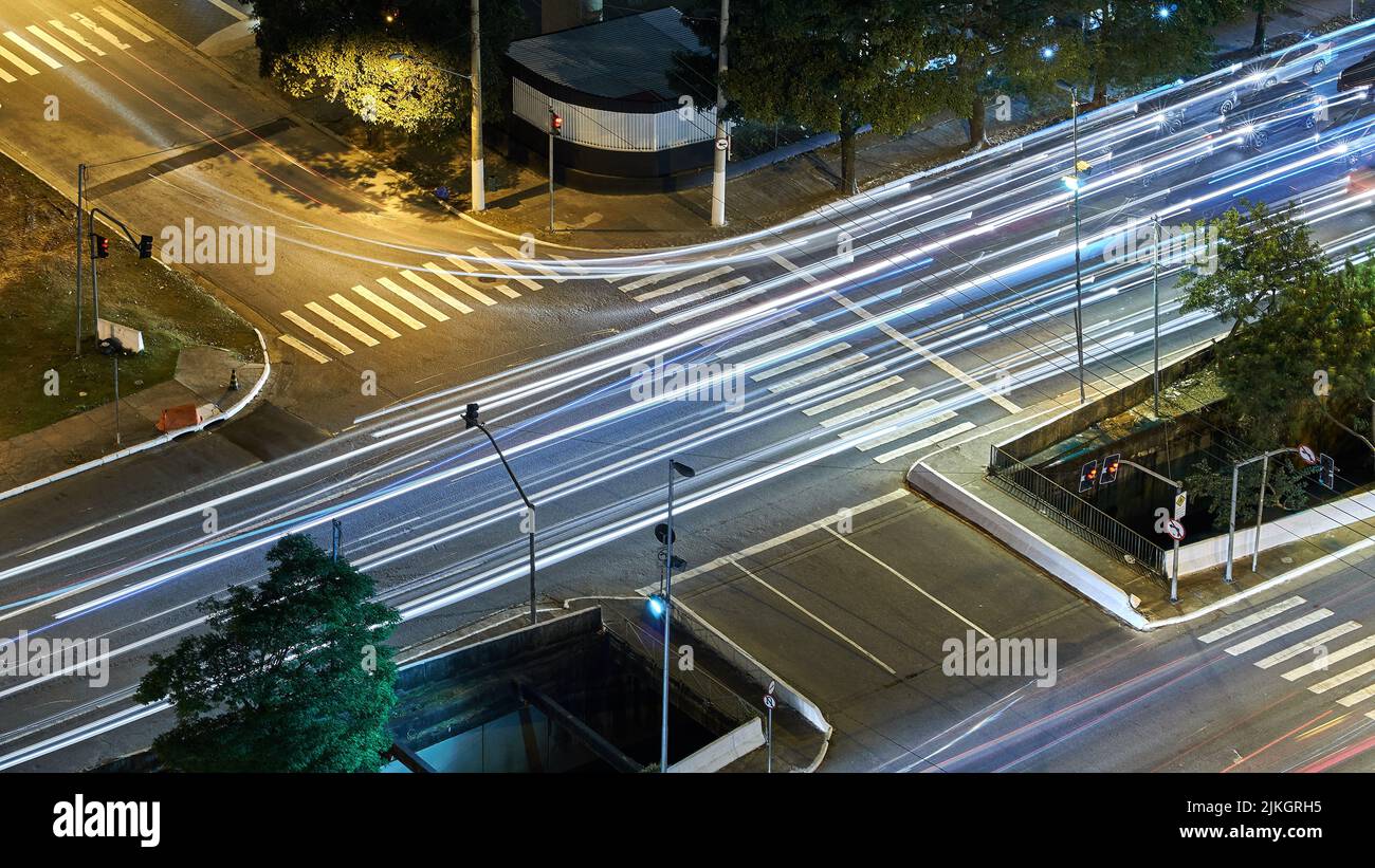 An aerial view of Sao Paolo highway traffic with lights in long ...