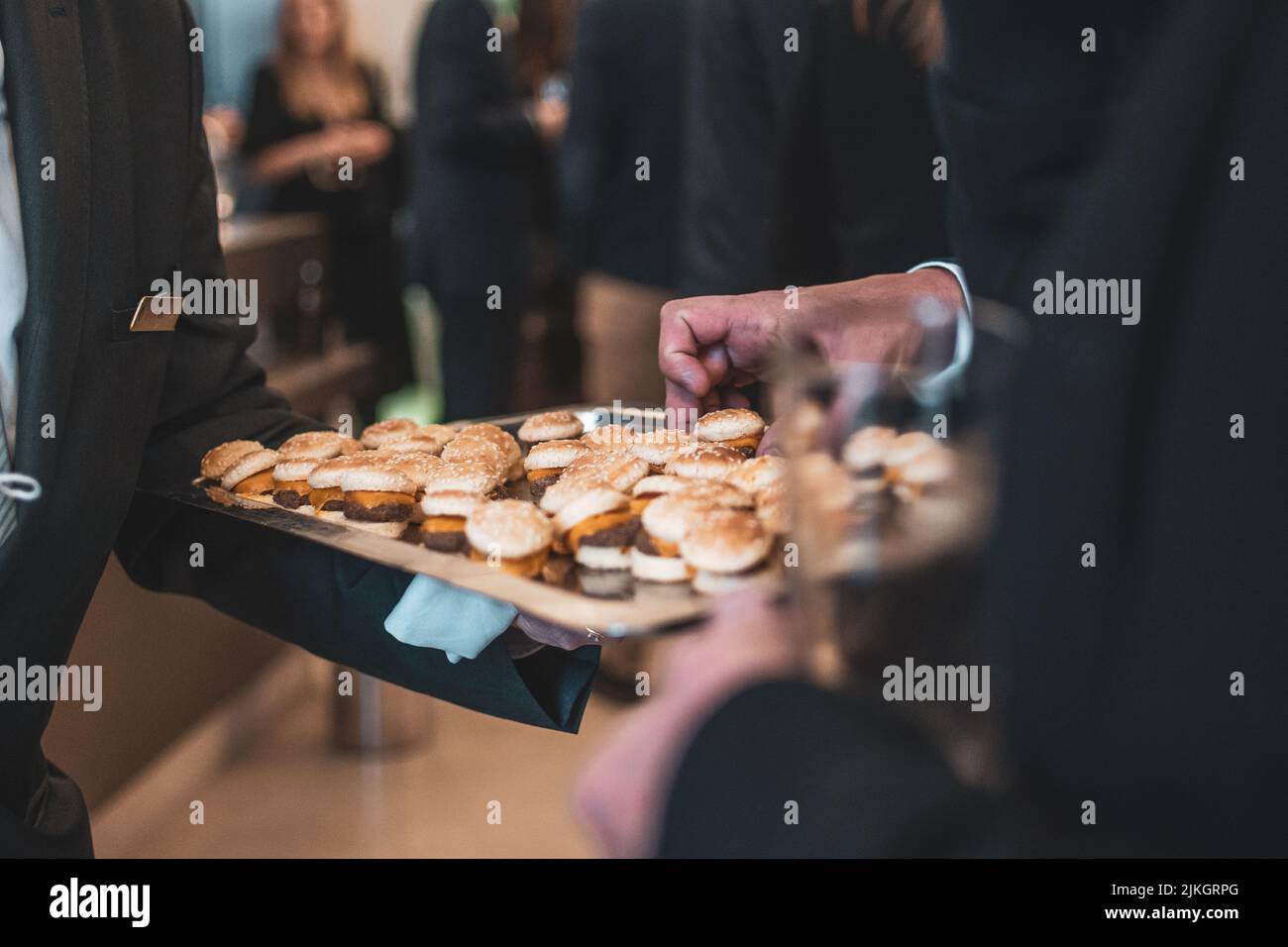 Waiter serving food restaurant hi-res stock photography and images - Alamy
